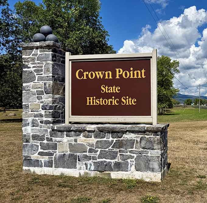 The entrance sign says it all, stacked stone, cannonballs on top, and centuries of incredible stories waiting just beyond.