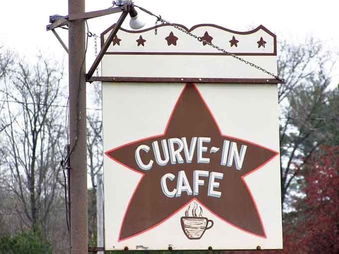 That star-shaped sign hanging roadside is basically a lighthouse for hungry people driving through Redgranite.