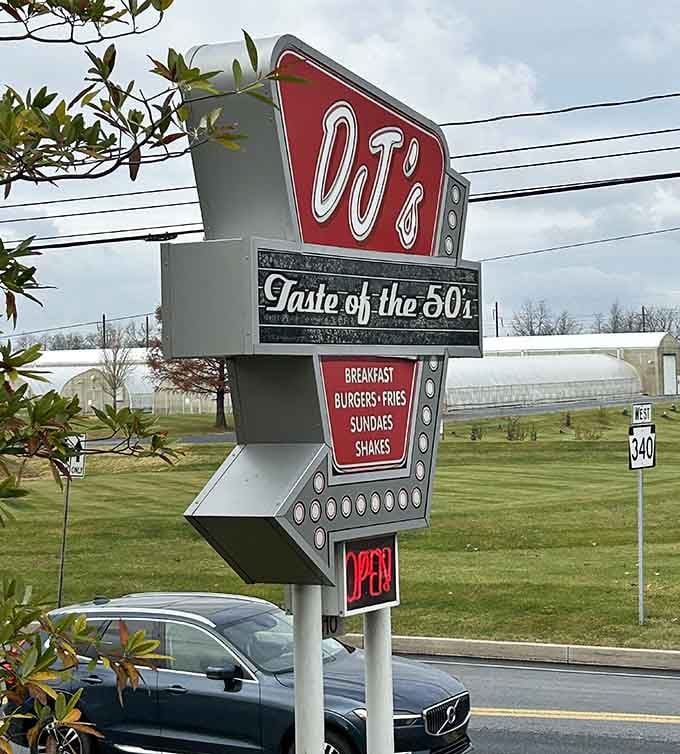That roadside sign is basically a promise, breakfast, burgers, sundaes, and shakes, and DJ's keeps every word of it.