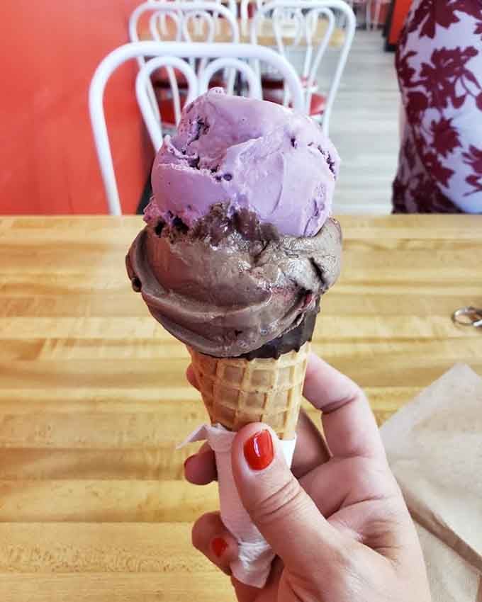 Two generous scoops on a waffle cone, one chocolatey and one purple-hued &mdash; this is exactly what a good day looks like.