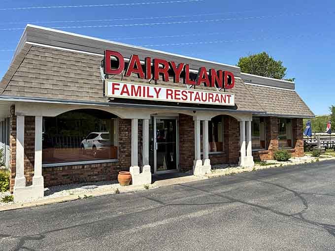 Brick exterior, white columns, and that bold sign standing tall, a Madison landmark hiding in plain sight.