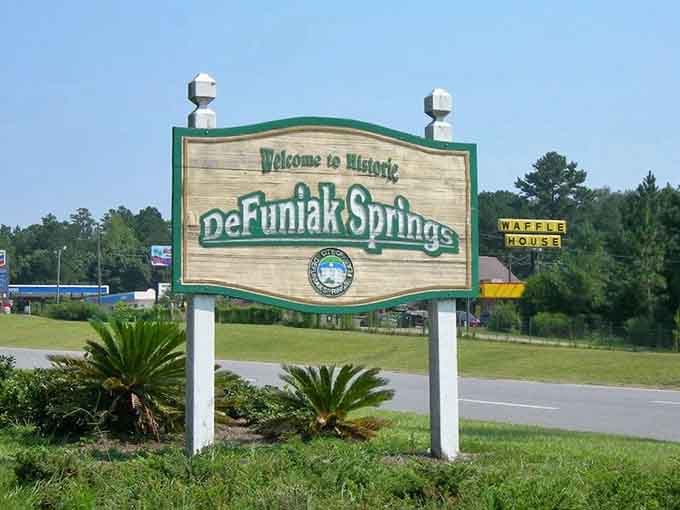 The welcome sign says historic, and DeFuniak Springs delivers on that promise before you even make it past the Waffle House.