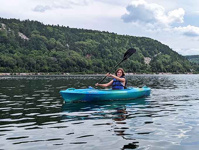 Paddling across Devil's Lake with ancient bluffs rising on both sides, this is the kind of afternoon that fixes everything.