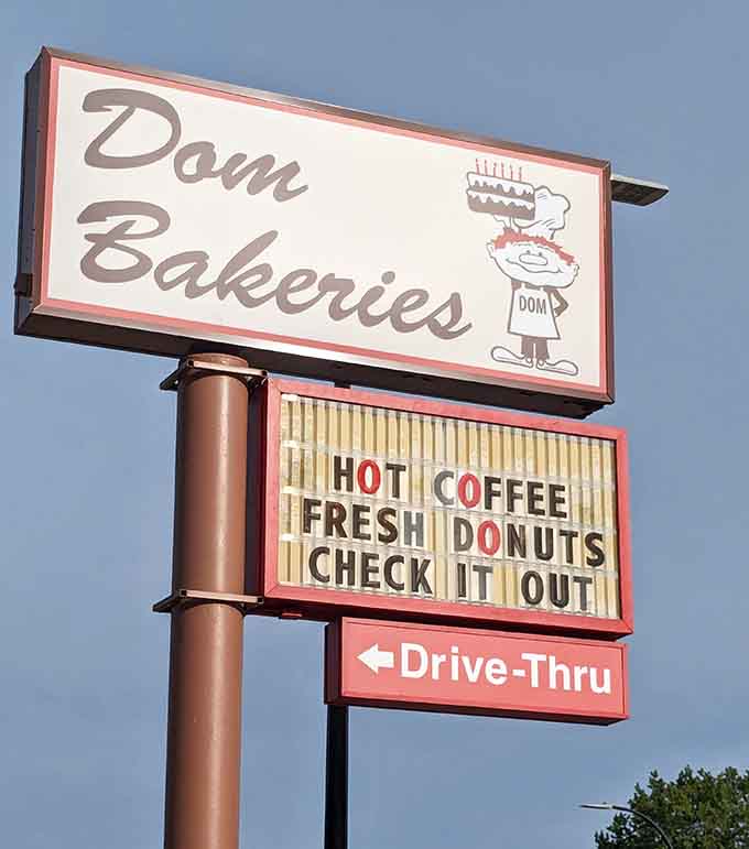 Hot Coffee. Fresh Donuts. Check It Out. Honestly, the Dom Bakeries sign is the most honest sign in Michigan.