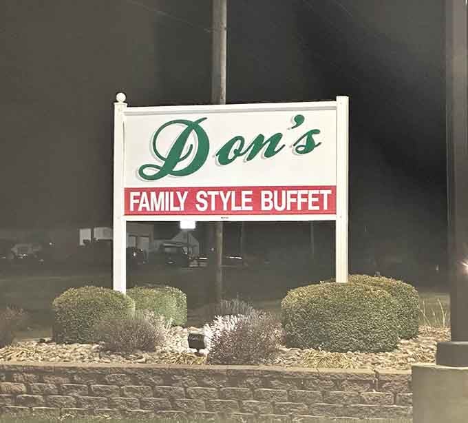 Glowing against the night sky, Don's sign is a quiet promise that a great meal is waiting for you.