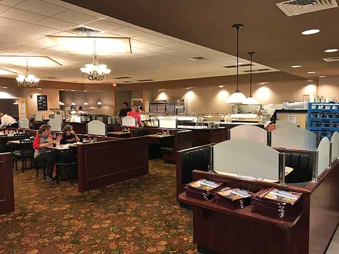 Booths, chandeliers, and a dining room that feels like it was built for people who actually enjoy sitting down together and eating well.