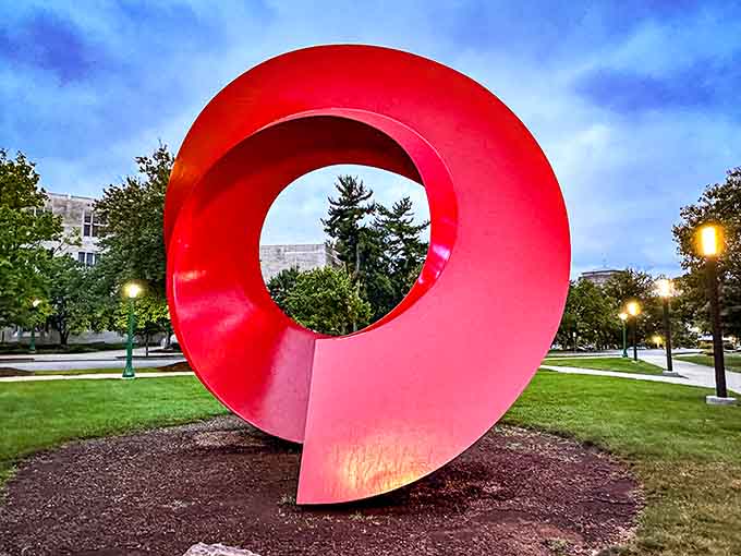 That bold red sculpture on the lawn is basically the museum saying hello from across the entire Indiana University campus.