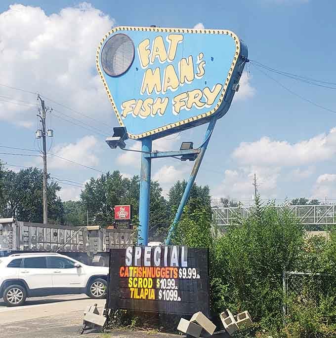 A classic roadside sign advertising daily specials under an open Michigan sky; this is exactly where you belong.