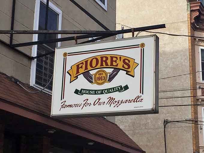 That sign has watched Hoboken transform around it while Fiore's just kept making the same perfect sandwiches since 1913.