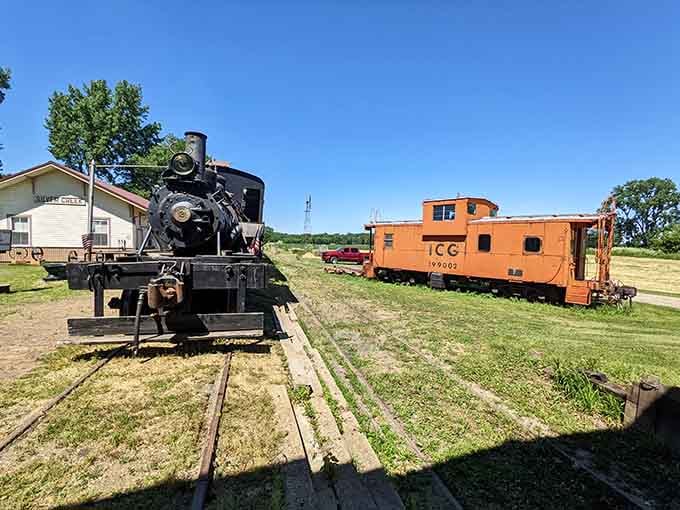 Vintage locomotives rest peacefully on the tracks, reminding visitors when steam power and steel rails connected America's heartland to everywhere.