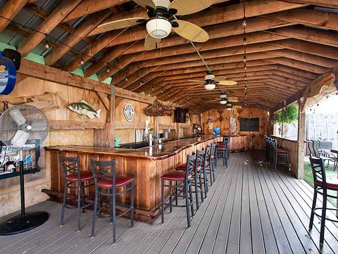 Arties Bar and Grill's open-air bar has exposed wooden beams, ceiling fans, and serious "I could stay here all afternoon" energy.