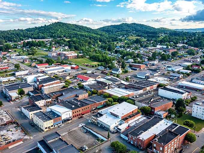From above, the town nestles between green ridges like a secret someone forgot to tell the world.