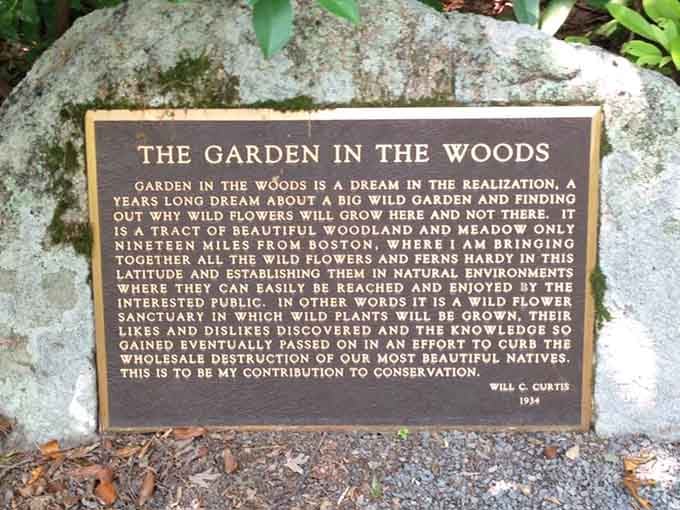 A 1934 bronze plaque on a boulder captures the original vision for this place, and it still holds up ninety years later.