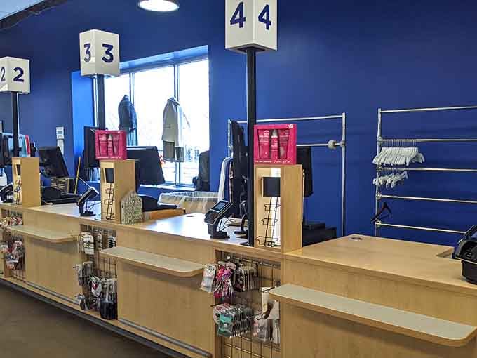 Numbered checkout lanes, a bright blue wall, and the finish line of a very rewarding treasure hunt.