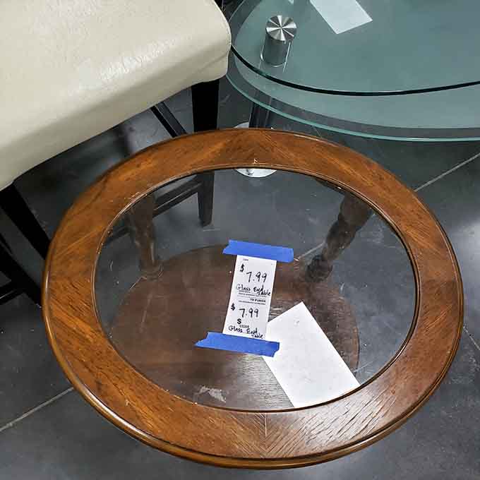 A solid wood and glass end table for a price that would make any furniture store manager quietly weep into their coffee.