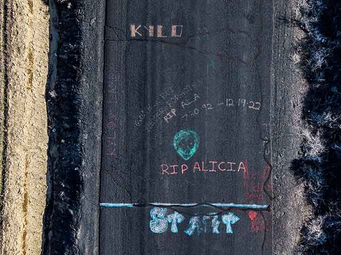 From above, the road reveals its secrets. The "Start" marking painted by visitors says it all perfectly.