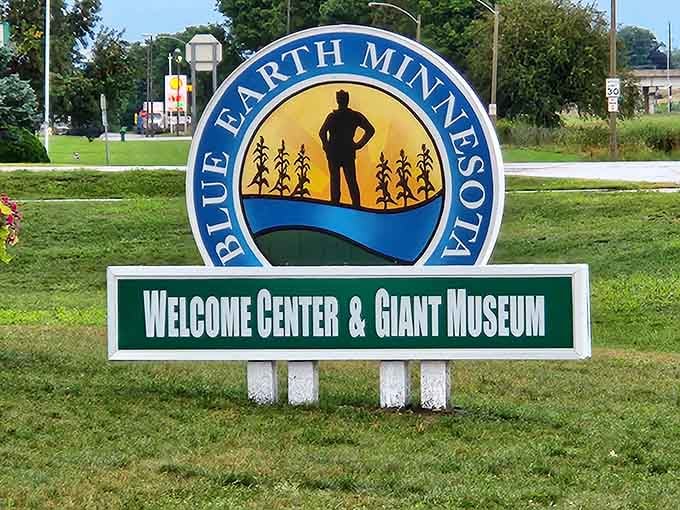 This welcome sign says it all: Blue Earth, Minnesota is rolling out the green carpet, and you're officially invited.