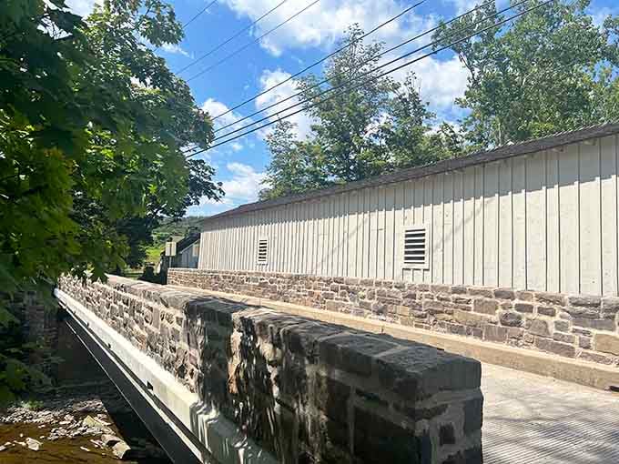 Those stone abutments have been holding steady since colonial times, quietly doing the heavy lifting while the bridge gets all the glory.