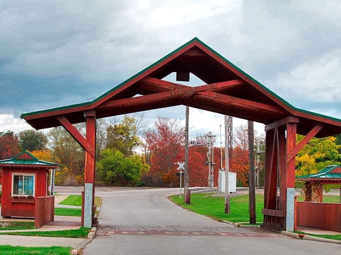 Fall foliage, a green roof, and deep red wood. This bridge in autumn looks like Ohio painted its own postcard.