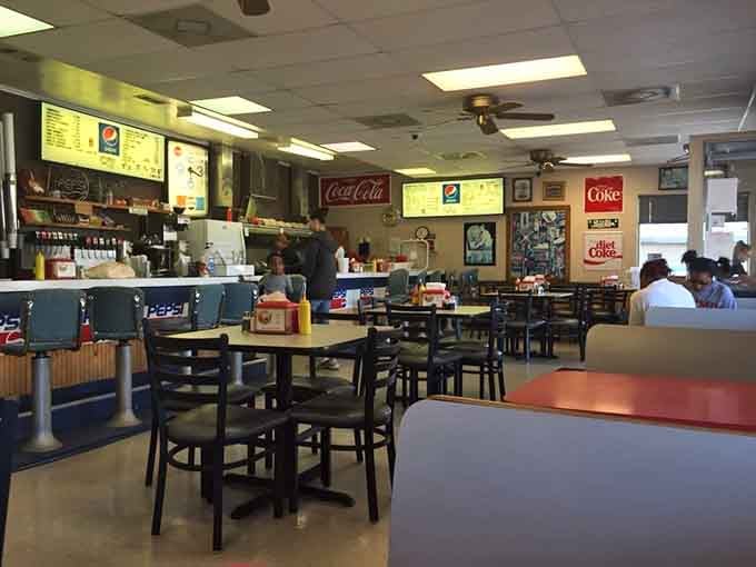 Tables, chairs, vintage signs, and the kind of easy atmosphere that makes you want to stay all afternoon.