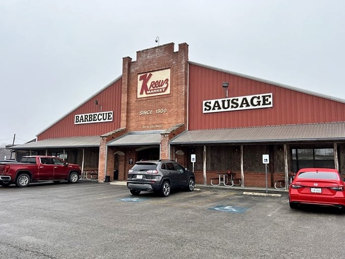 The parking lot at Kreuz Market tells the whole story. People drive from everywhere for what's waiting behind those front doors.