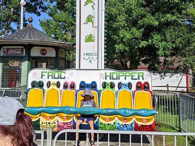 Sitting front and center on the Frog Hopper, this kid has the calm energy of someone who has absolutely done this before.