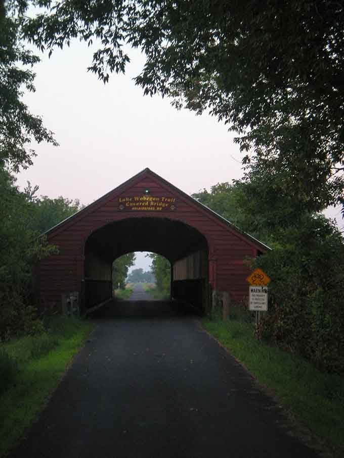 Early morning fog wraps around the bridge like a secret this corner of Minnesota kept just for you.