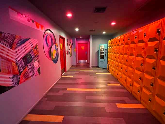 Bright orange lockers line the hallway, keeping your belongings safe while you chase that perfect game.