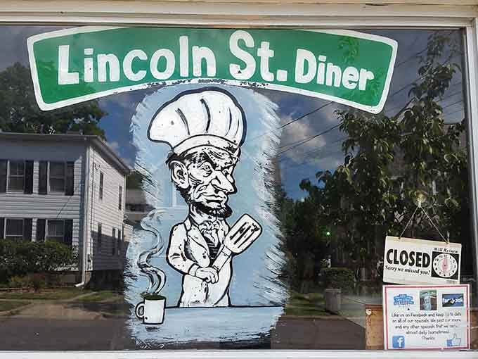 Abraham Lincoln in a chef's hat holding a spatula, the diner's window mural that wins every neighborhood character contest, hands down.