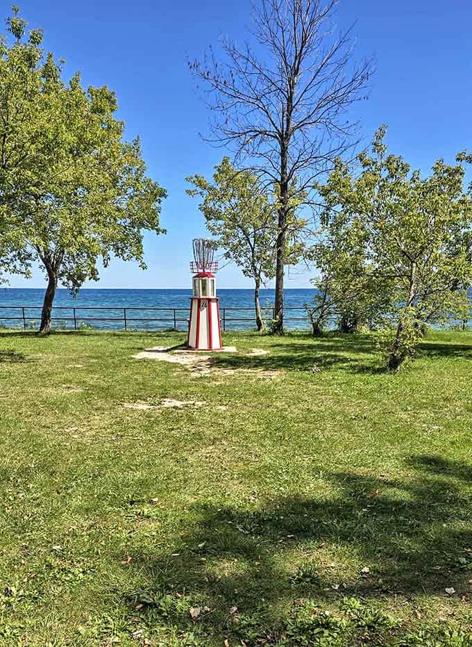 A charming lighthouse replica overlooks Lake Michigan, proving even landlocked states understand maritime romance perfectly well.