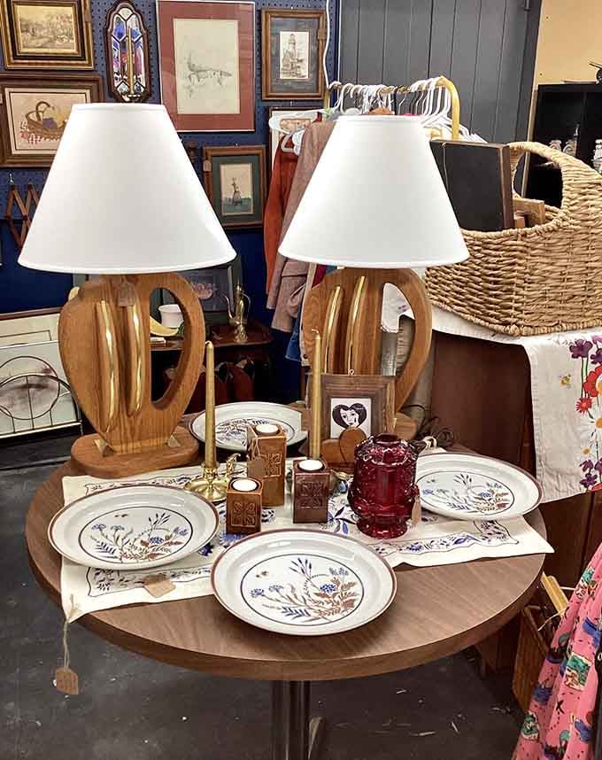 A pair of warm wood and brass lamps staged just right, reminding you that home always matters.