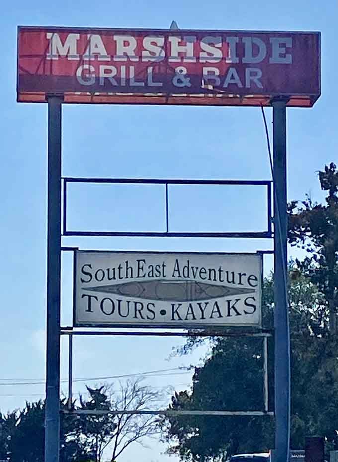 The sign outside promises tours, kayaks, and great food. Marshside Grill is the whole coastal package.