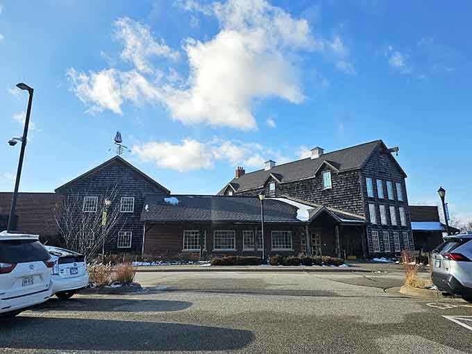 Even the parking lot view hints at something special waiting inside. The cedar shake roofline alone earns the drive down.