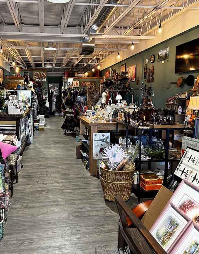 A long aisle of carefully arranged treasures under warm Edison bulbs, the kind of shopping experience that makes you slow down and breathe.