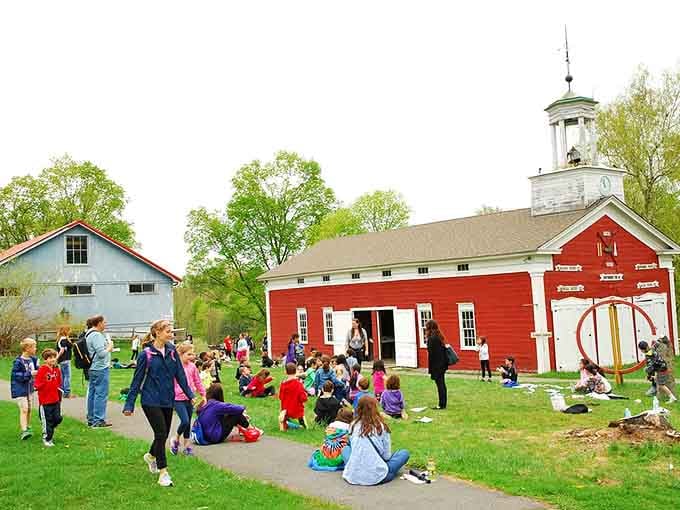 School groups gather outside the firehouse, discovering that history class hits completely different when the walls are real.