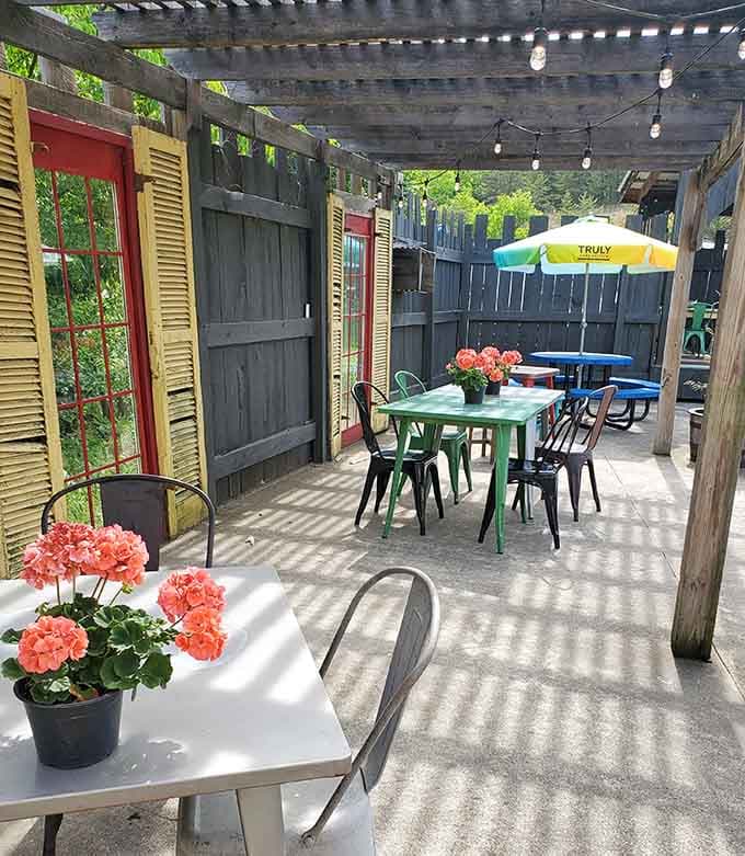 String lights and flowers make this covered patio the kind of spot where you'll "just stop for gas" and stay for an hour.