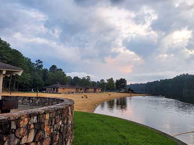 Late afternoon light over the beach and stone buildings, proof that Alabama sunsets don't need an ocean to impress.