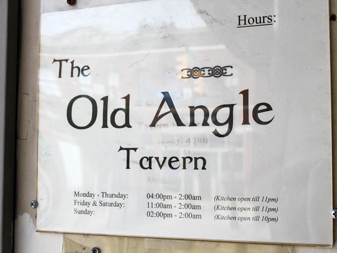 The hours posted on the door, because a place this good deserves to be visited on purpose, not by accident.
