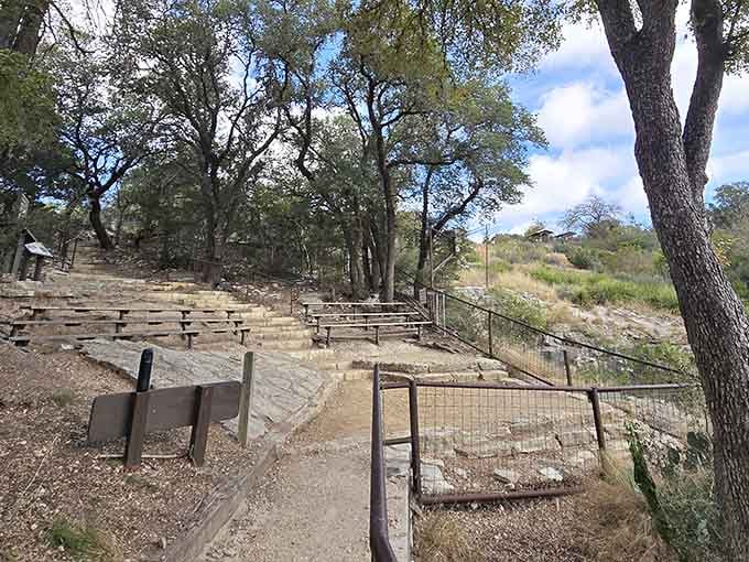 Tiered seating carved right into the hillside, nature's own amphitheater built for the greatest free show in Texas.