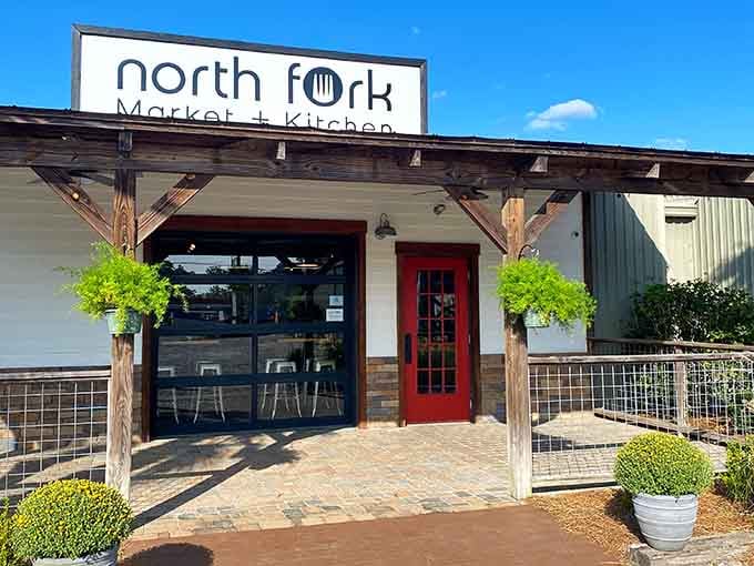 North Fork Market and Kitchen's bright red door and fresh greenery say come on in, something good is happening here.