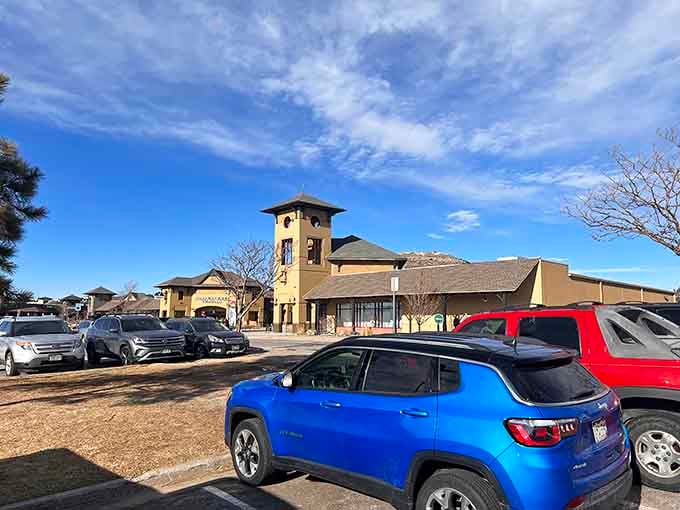 Blue skies, a clock tower, and a parking lot full of people who made a very smart decision today.