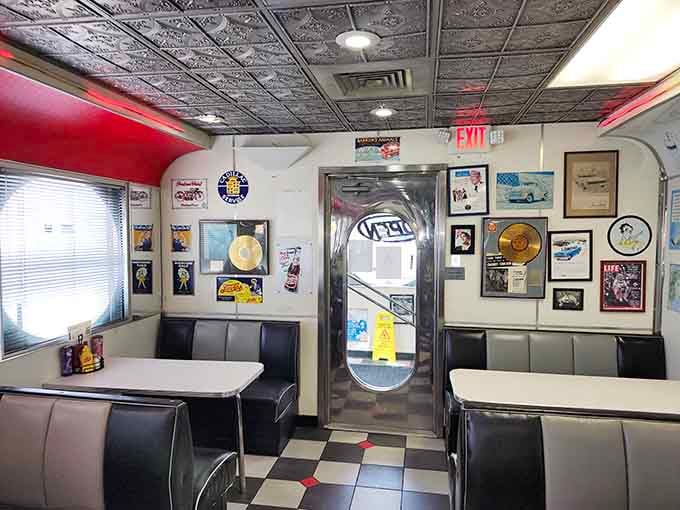 Framed prints, gold records, and a classic chrome door. Every corner of this diner tells a story.