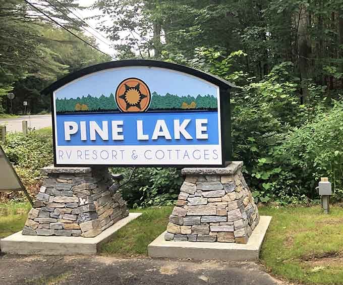 The stone-based Pine Lake sign, a proper welcome that sets the tone perfectly.