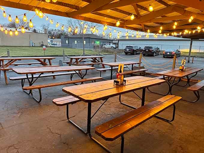 String lights, picnic tables, and open air. Eating outside here feels like the best kind of summer evening.
