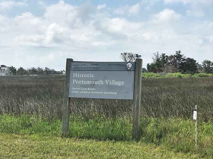 The National Park Service sign standing guard over the marsh like a proud sentinel. Historic Portsmouth Village, still reporting for duty.