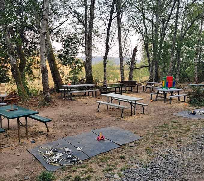 Lawn games, picnic benches, and mountain views in the background. The fun doesn't stop when the pedaling does.