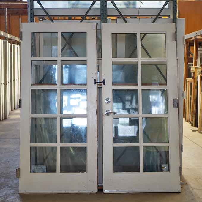 A pair of classic French doors with divided glass panels, the kind of elegant find that makes a renovation project feel truly special.