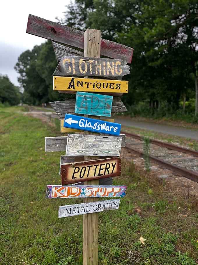 A handpainted outdoor signpost points every direction at once, which is exactly the right way to navigate a place this wonderfully full.