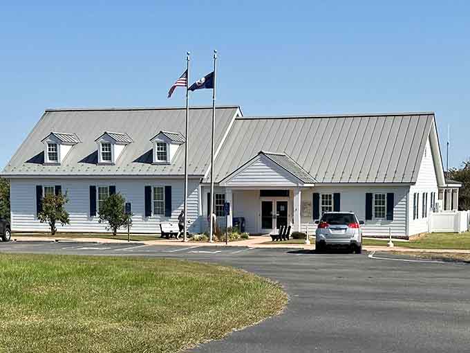 Two flags flying proudly above a crisp white visitor center, welcoming you to one of Virginia's most underrated treasures.