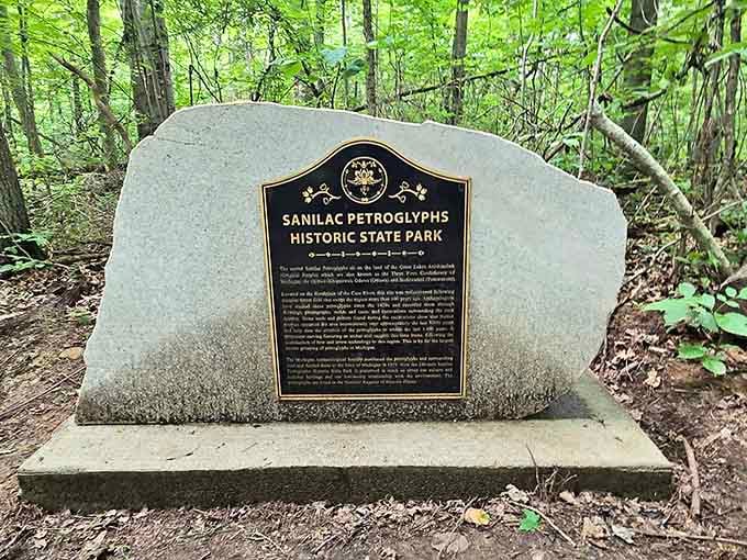 This granite marker stands quietly in the woods, marking one of Michigan's most extraordinary and underrated historic treasures.